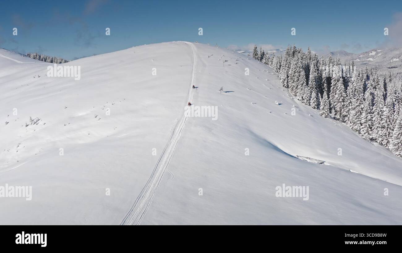 Two snowmobile tracks on hi-res stock photography and images - Alamy
