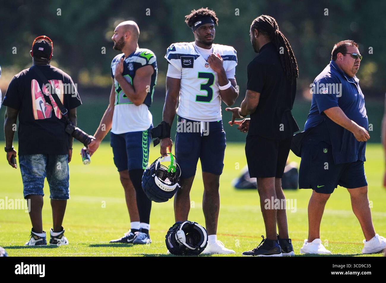 Seattle Seahawks safety Nick Emmanwori talks with former Seahawks ...