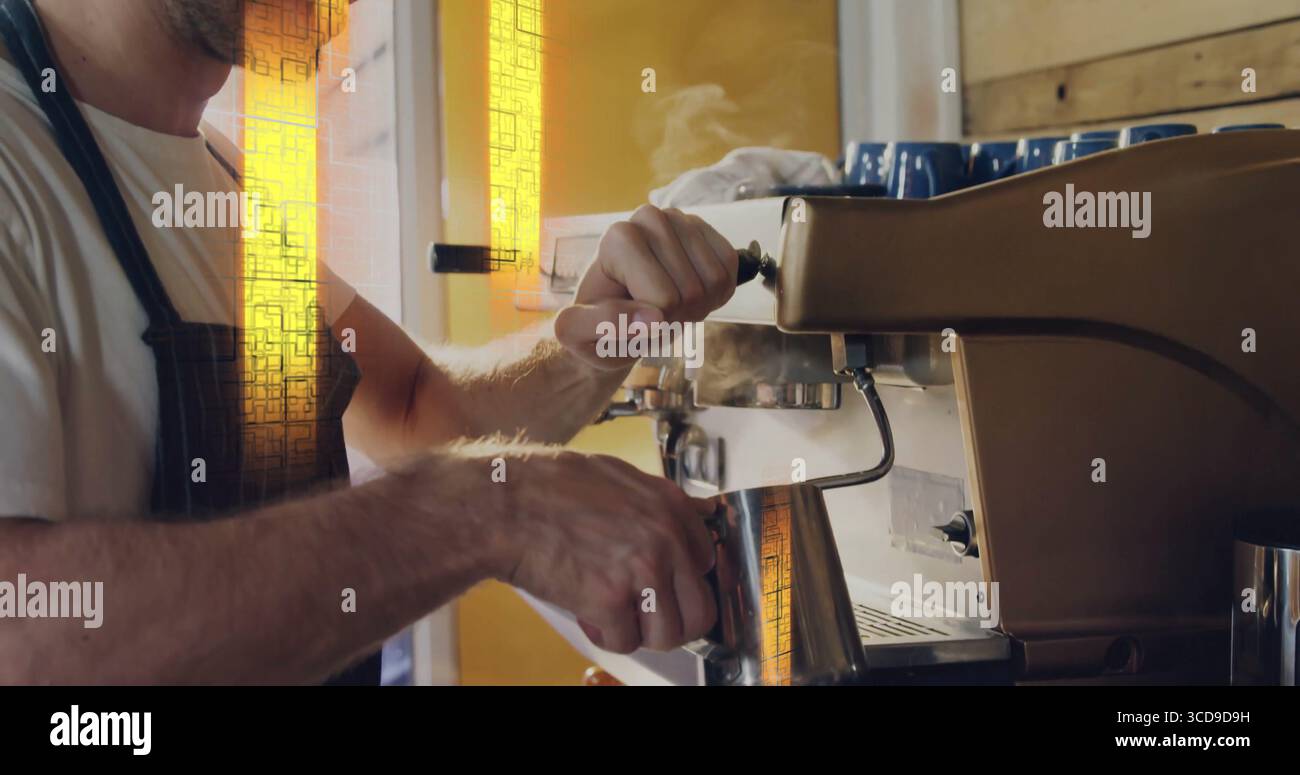 Barista frothing milk in metal pitcher using steam wand at cafe ...