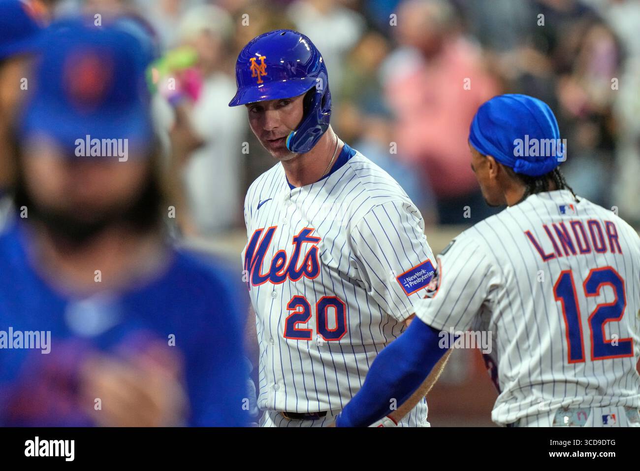 New York Mets' Pete Alonso (20) walks to the dugout after hitting a two ...