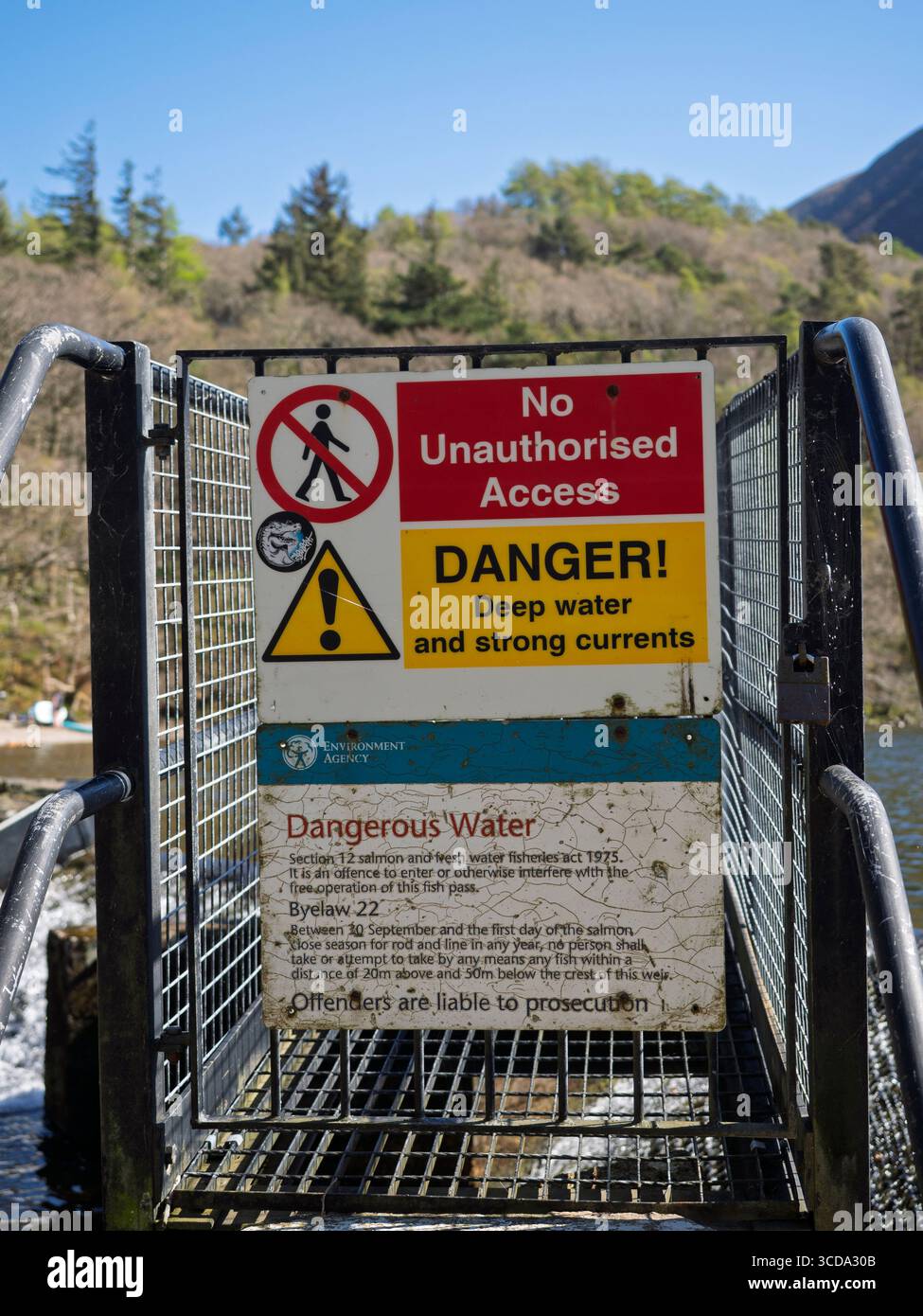 Danger deep water and no swimming sign.Warning sign by the water ...