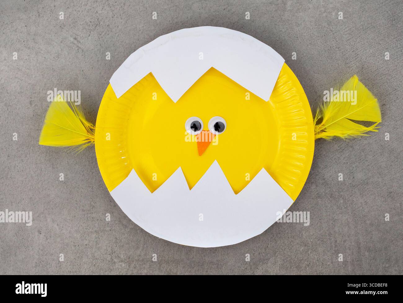 paper plate craft of a little chick hatching from a egg Stock Photo - Alamy