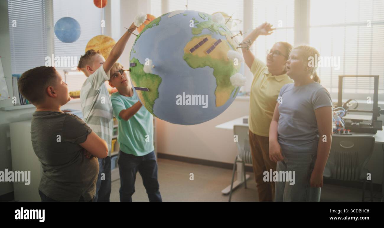Environmental Science Lesson: Primary School Children Talking, Looking ...