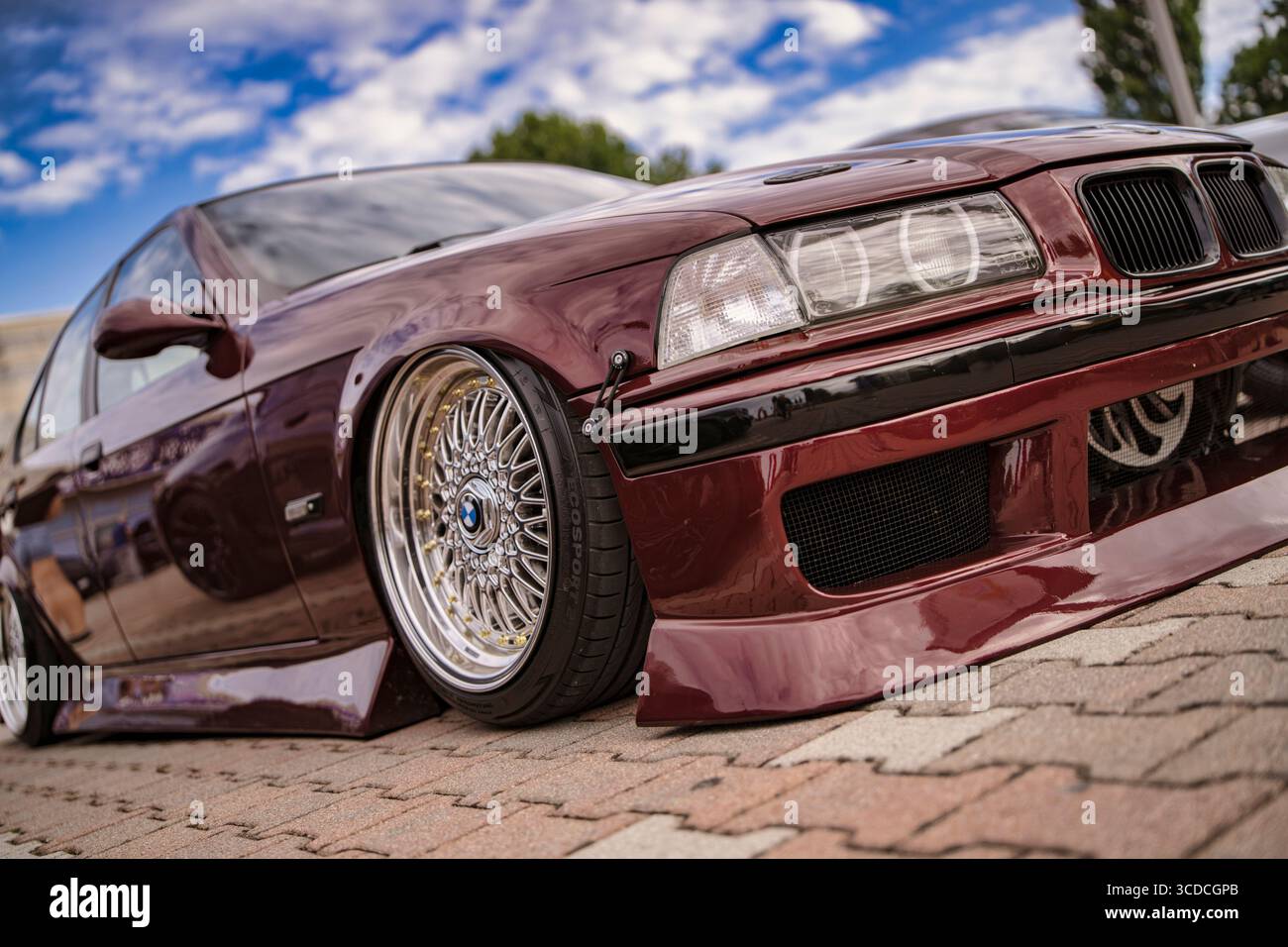 Rome, italy 18 july 2025, low rider bmw e36 showcasing stance tuning ...