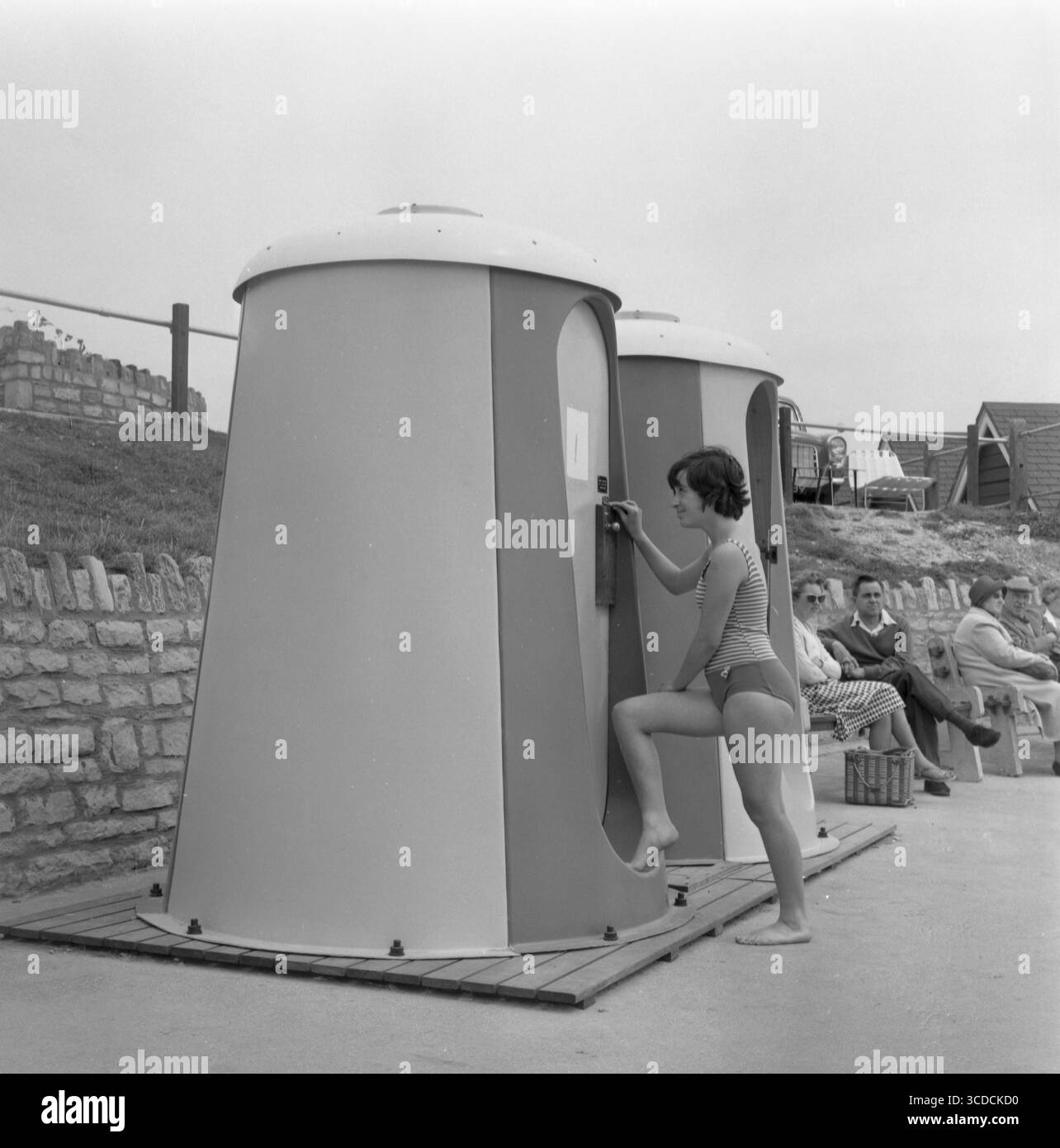 Two of the brightly colored glass fiber bathing huts, popularly known ...