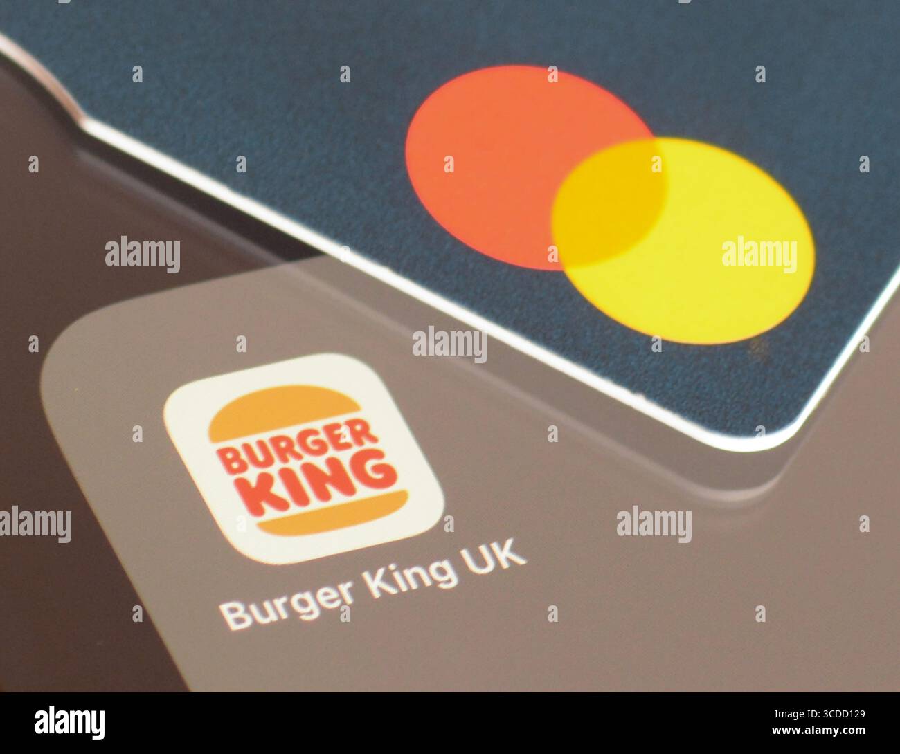 Burger King UK app on smartphone screen with a Mastercard to make ...
