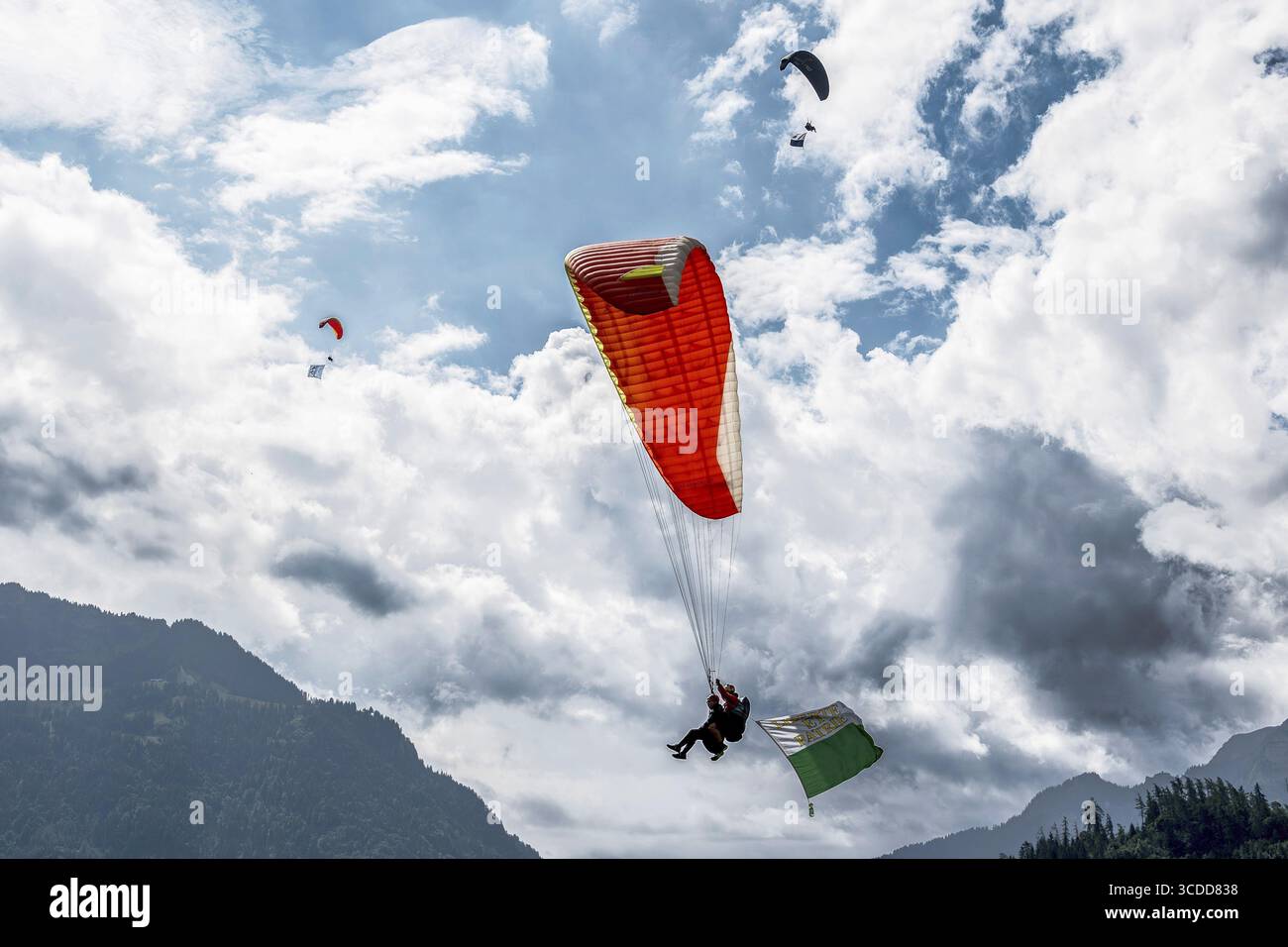 Paragliding tandem flight canton Vaud flag, Interlaken, Switzerland ...