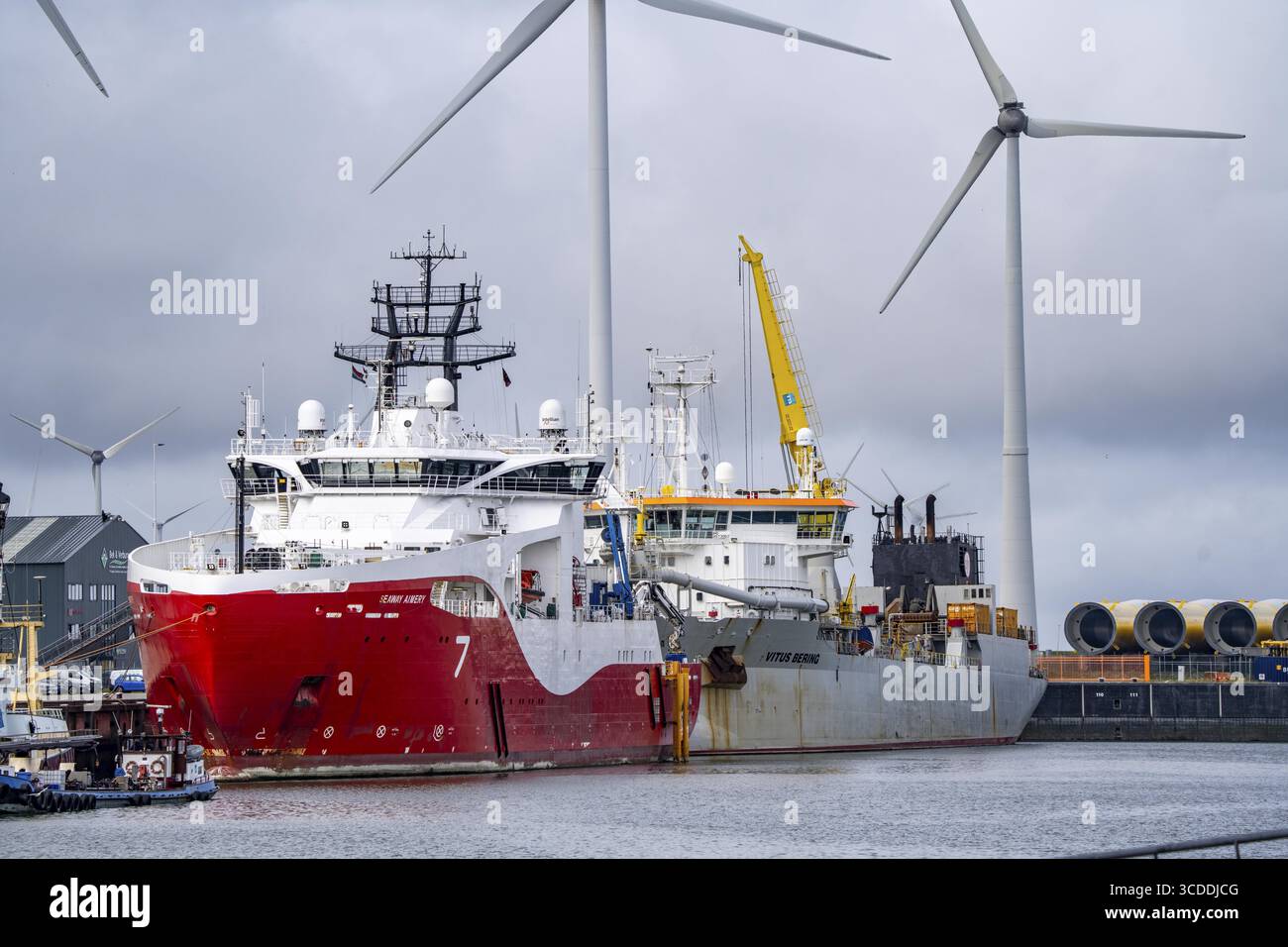 Working vessels in the seaport of Eemshaven, dredger Vitus Bering, aft ...