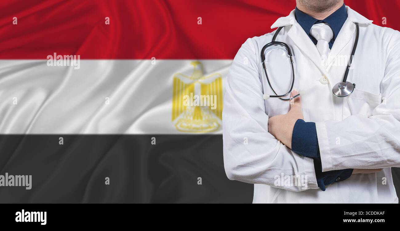 Male doctor with stethoscope on Egypt flag. Doctor holding stethoscope ...