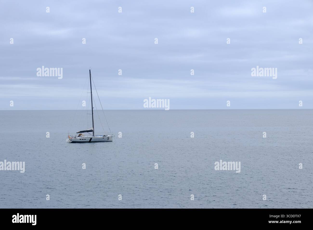 09 AUG 2025 - Cornwall, England, UK - A sailing Yacht at anchor off the ...