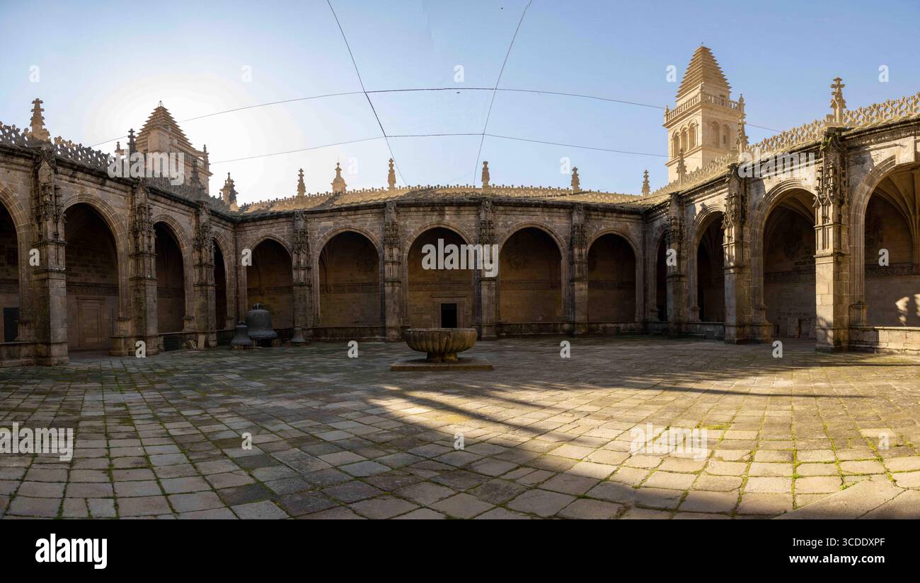 Panoramic view of a historic cloister with arches and towers Stock ...