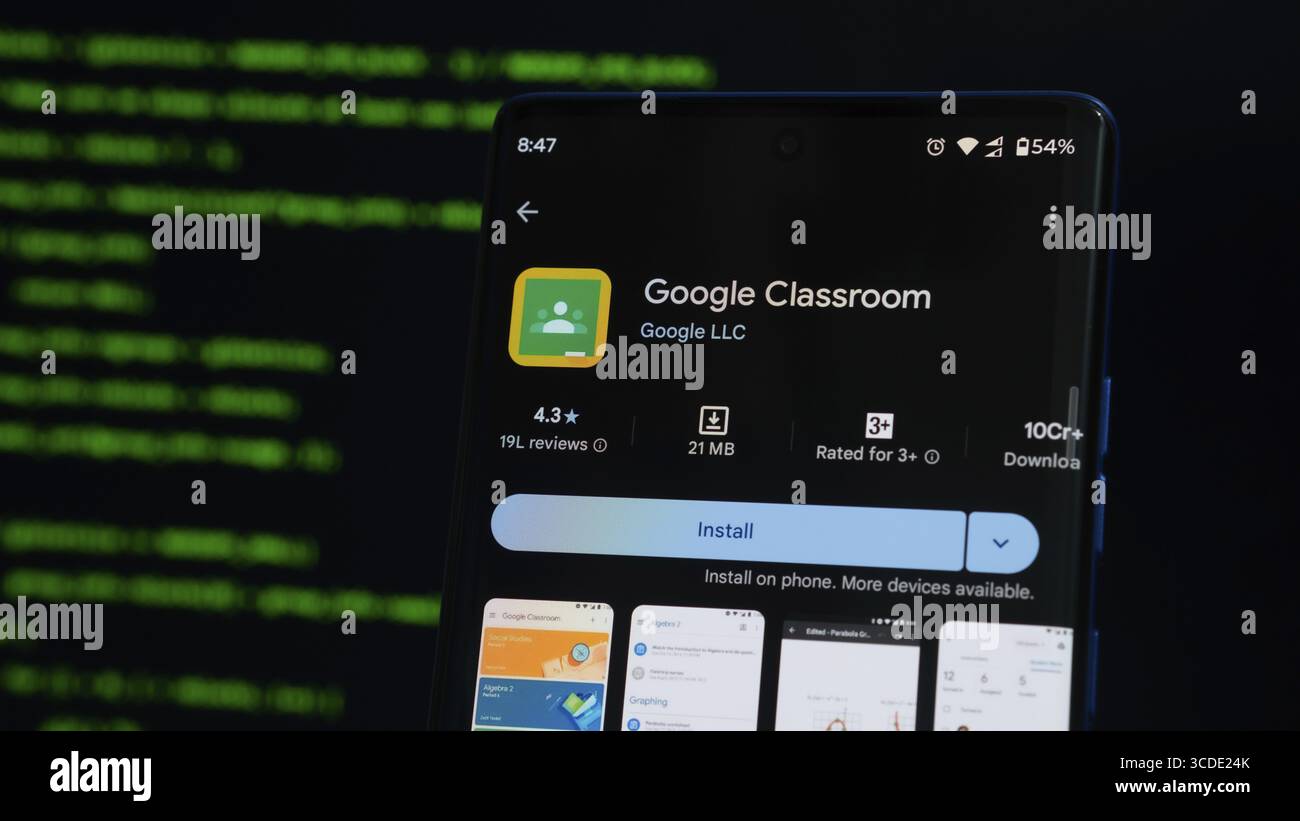Google Classroom app on a phone with a code-themed background Stock ...