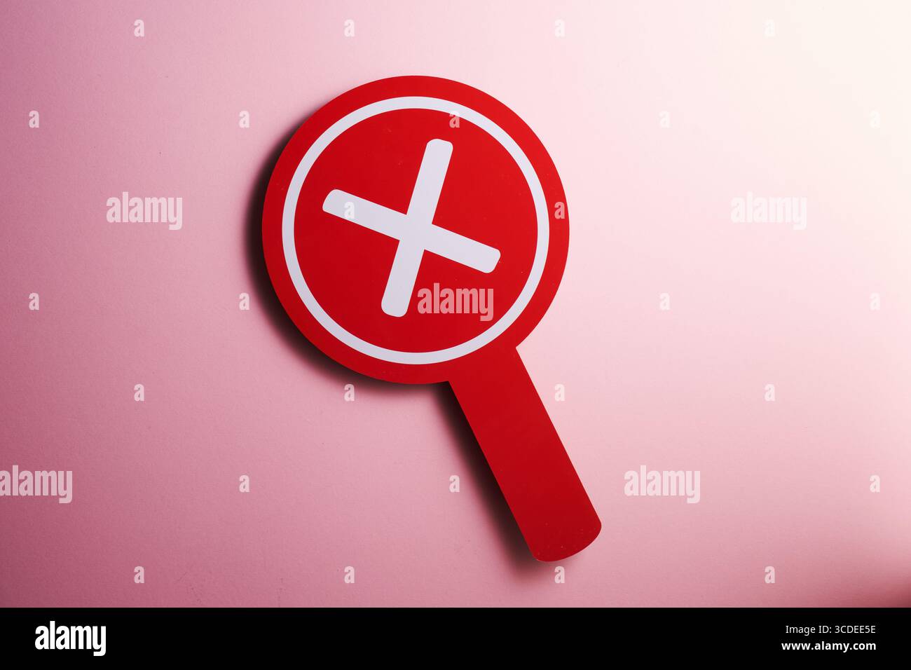 stick with red cross sign Stock Photo - Alamy