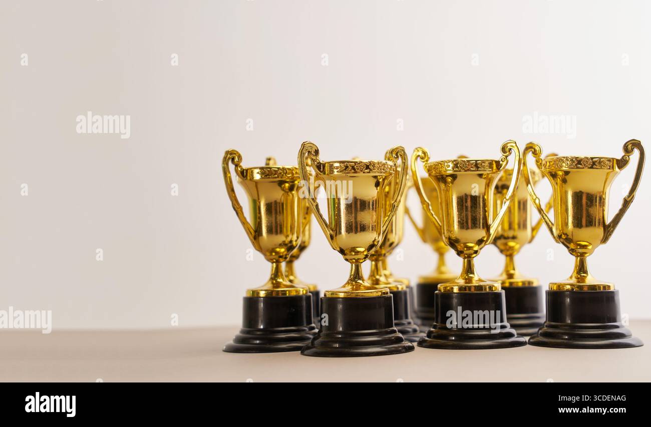 group of trophies in a row Stock Photo - Alamy