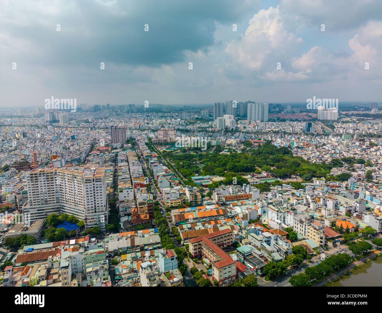 Aerial View of Dense Urban Landscape and Green Park Area in Ho Chi Minh ...