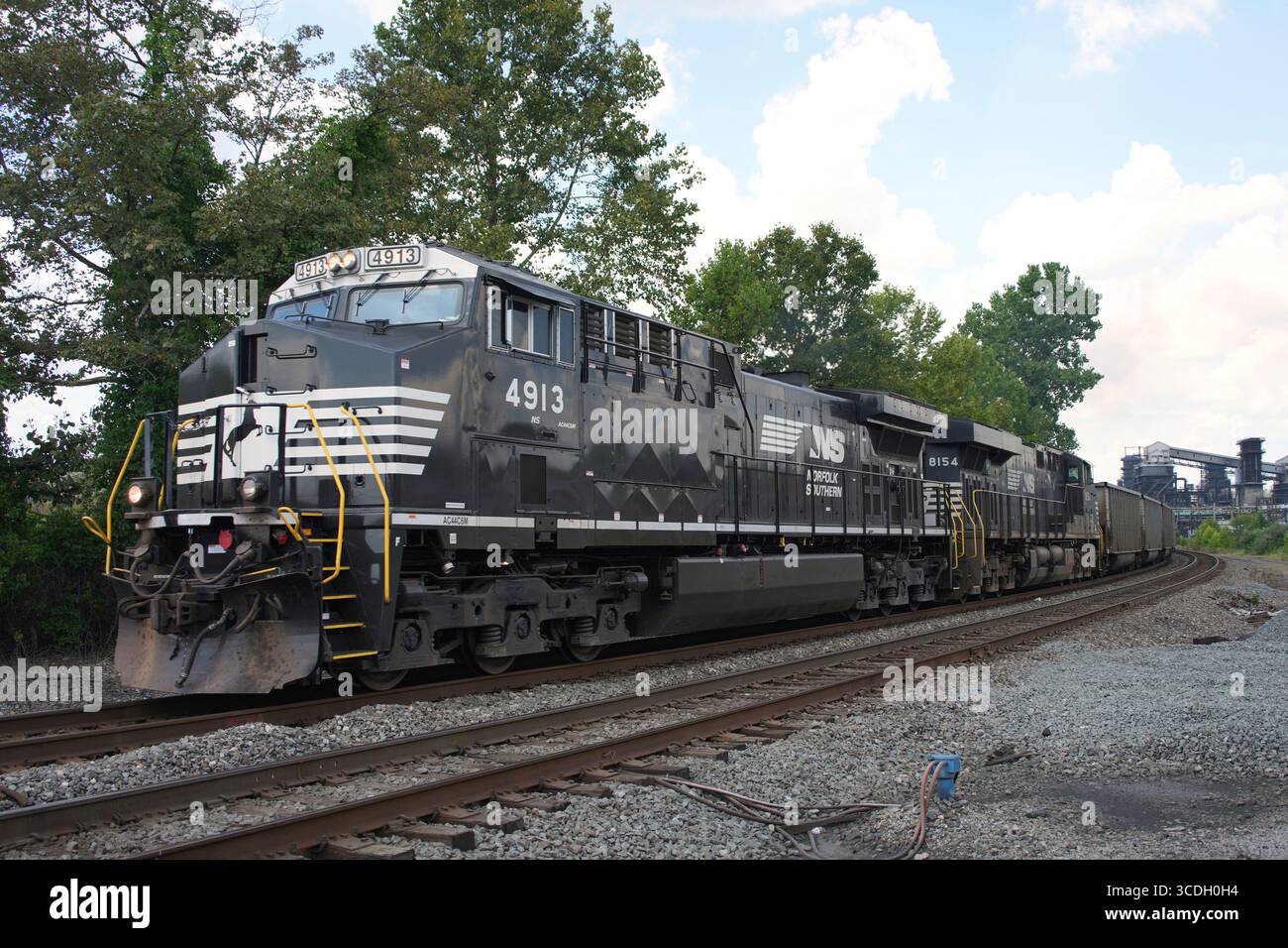A Norfolk Southern freight train rolls past the U.S. Steel's Clairton ...