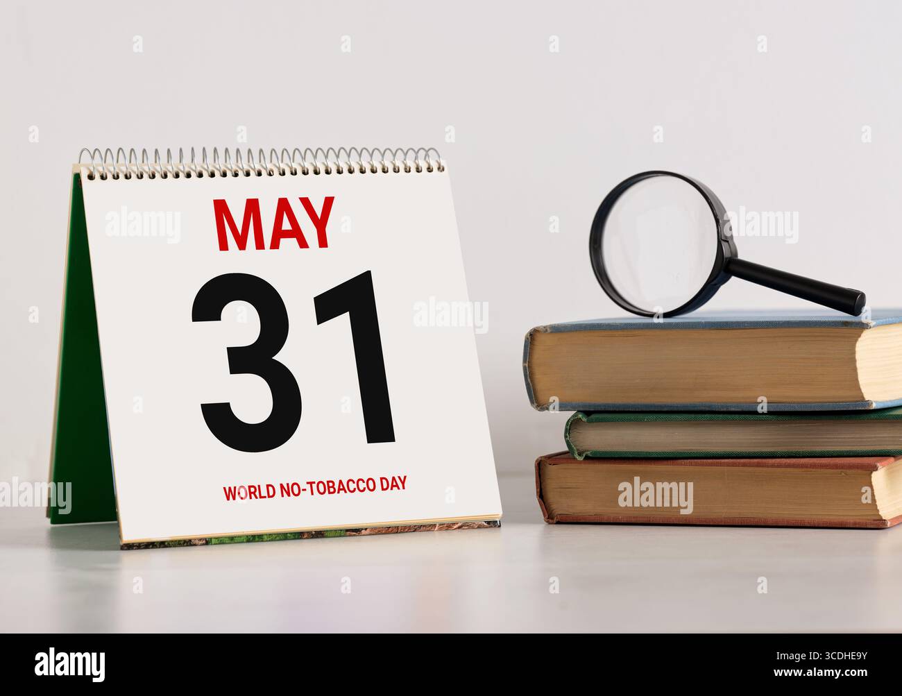 Calendar page showing may 31, world no tobacco day, with magnifying ...