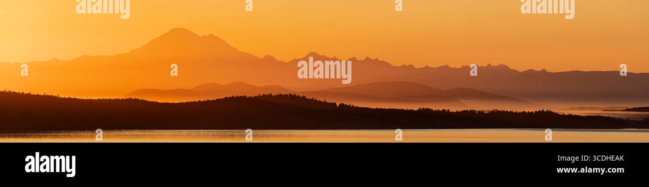 Mount Baker at sunrise seen across Haro Strait from Mount Tolmie near ...