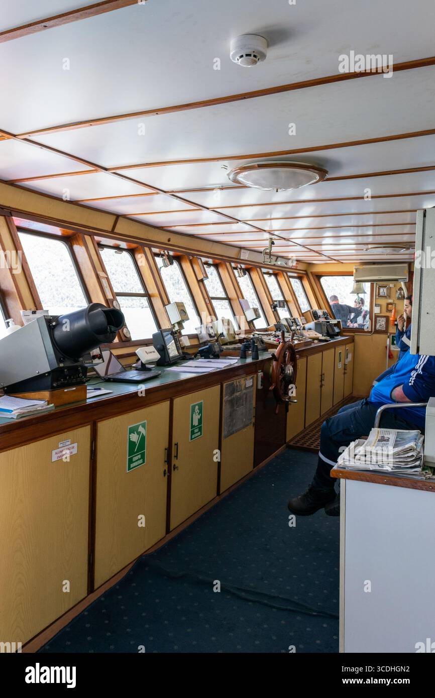 Empty command bridge of a ferry sailing in chile patagonia with captain ...