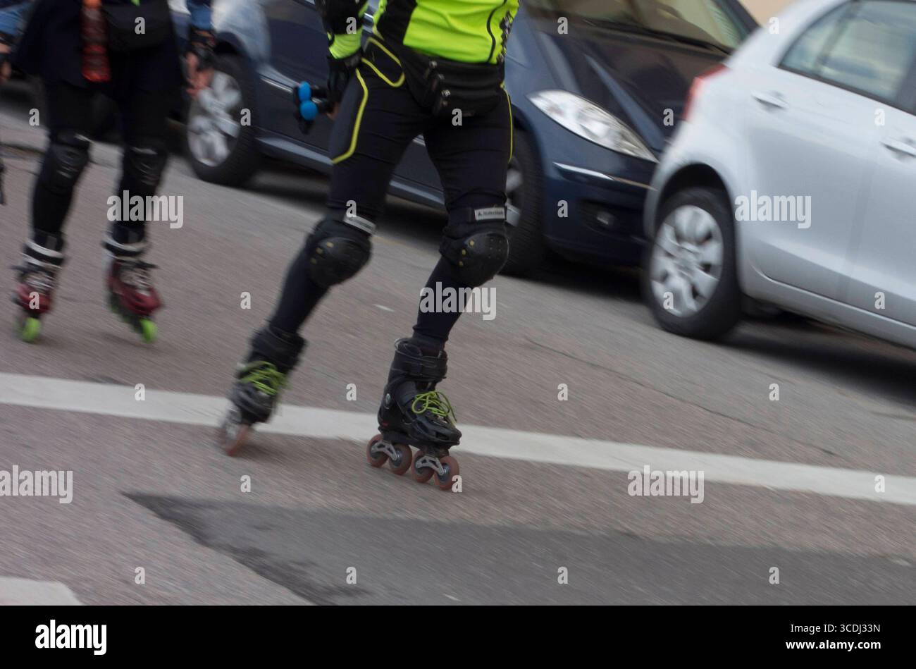 inline skating popular outdoor sport on the street and in the park ...