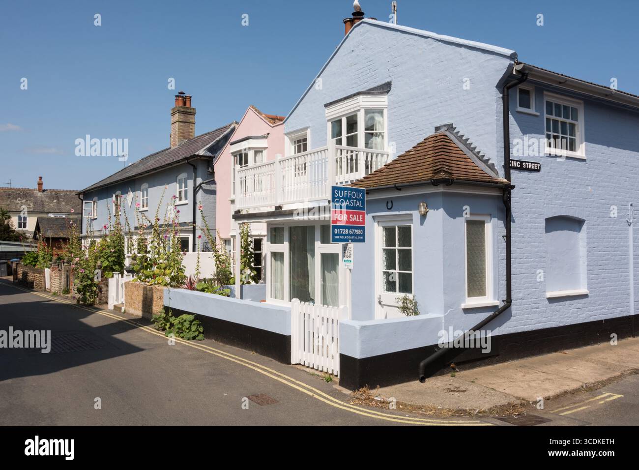 Colourful seaside houses on King Street at Aldeburgh, a coastal town ...