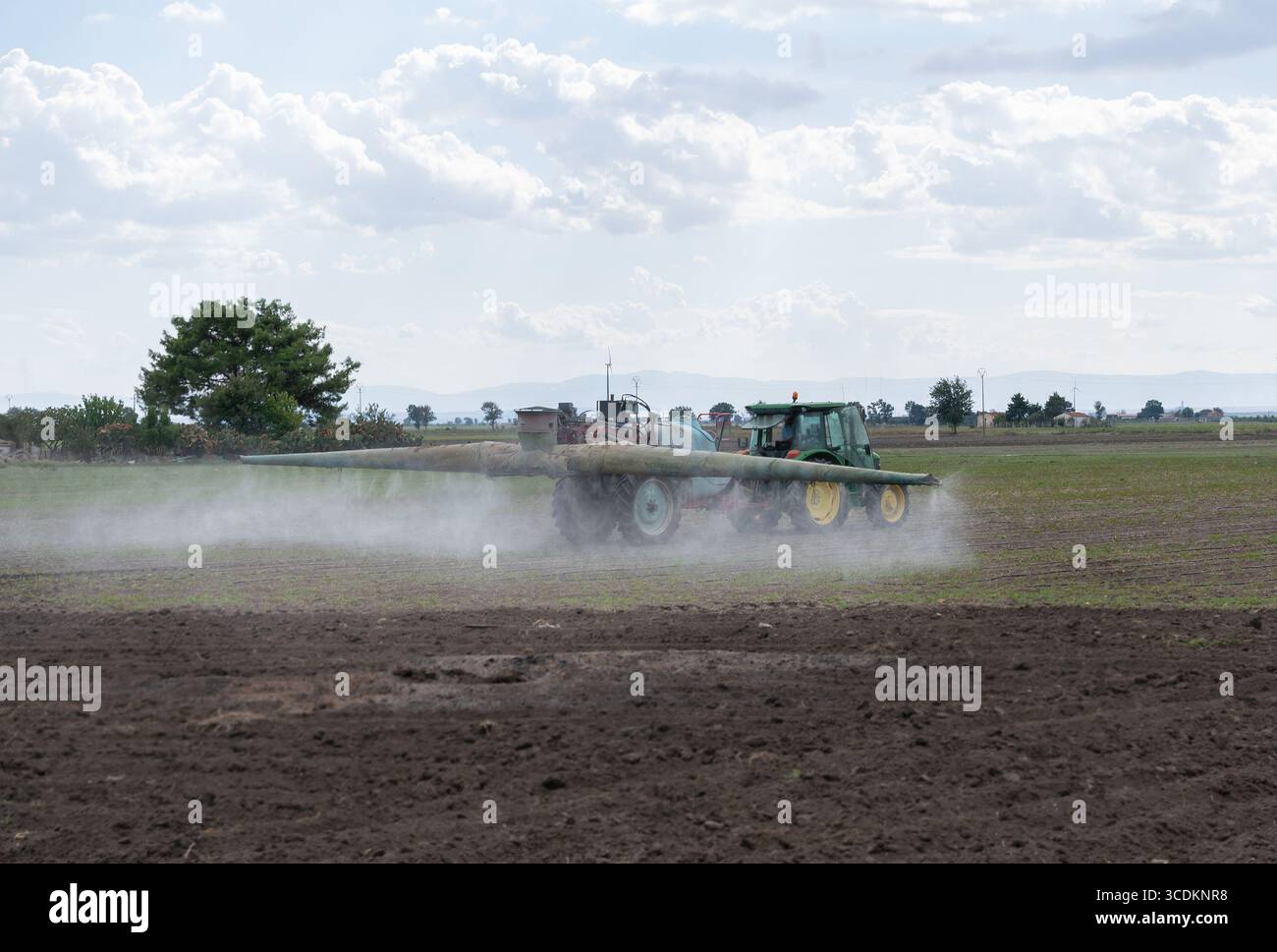 Agriculture tractor spray fertilize industrial hi-res stock photography ...
