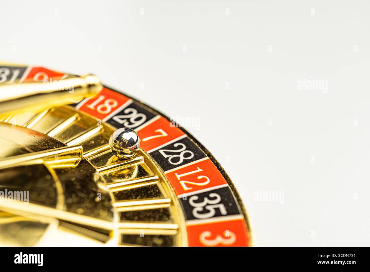 Image of a casino roulette wheel with vibrant gold trim, rich red ...