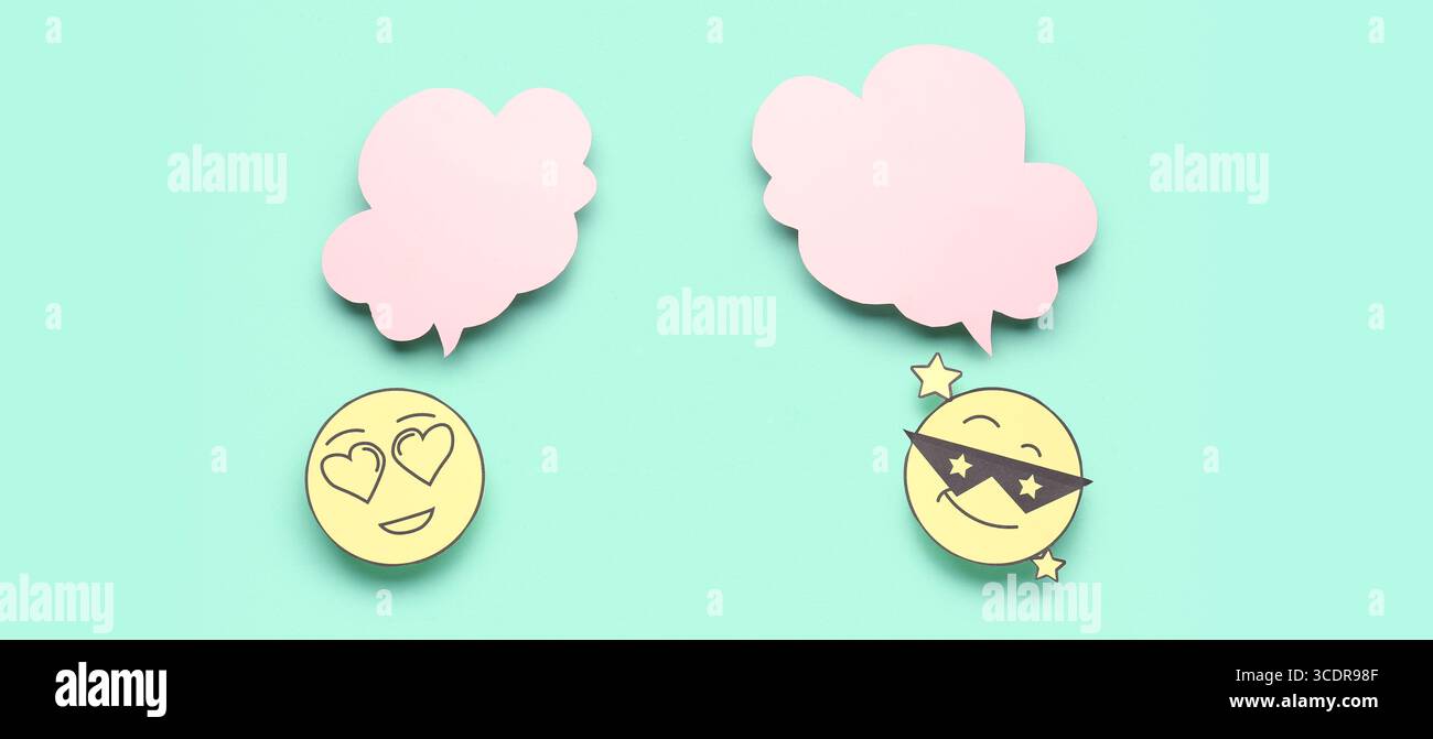 Paper emoticons and blank speech bubbles on turquoise background ...