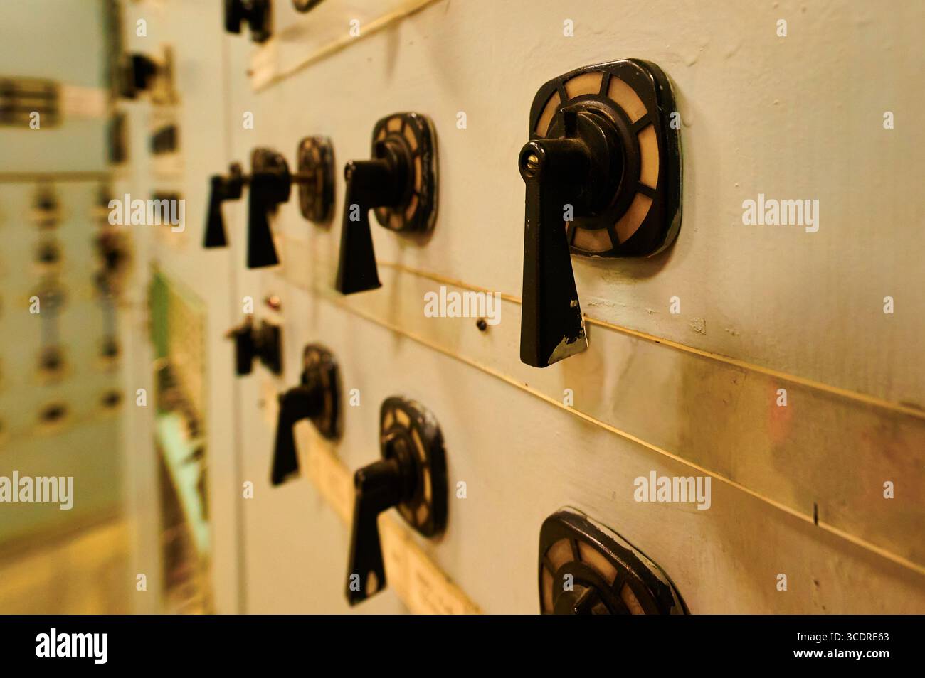 Detailed view of operational control switches in an industrial setting ...