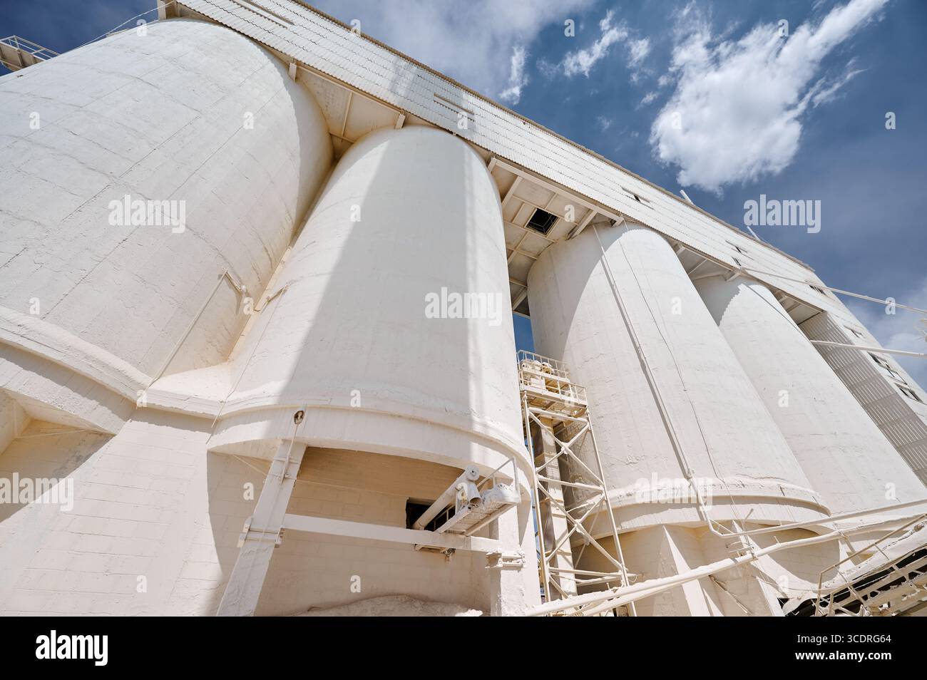 Concrete silos for storage of limestone products at plant Stock Photo ...