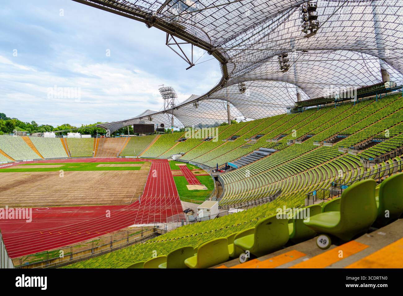 Stadium Grandstand with Running Track, Green Seats, and Modern ...