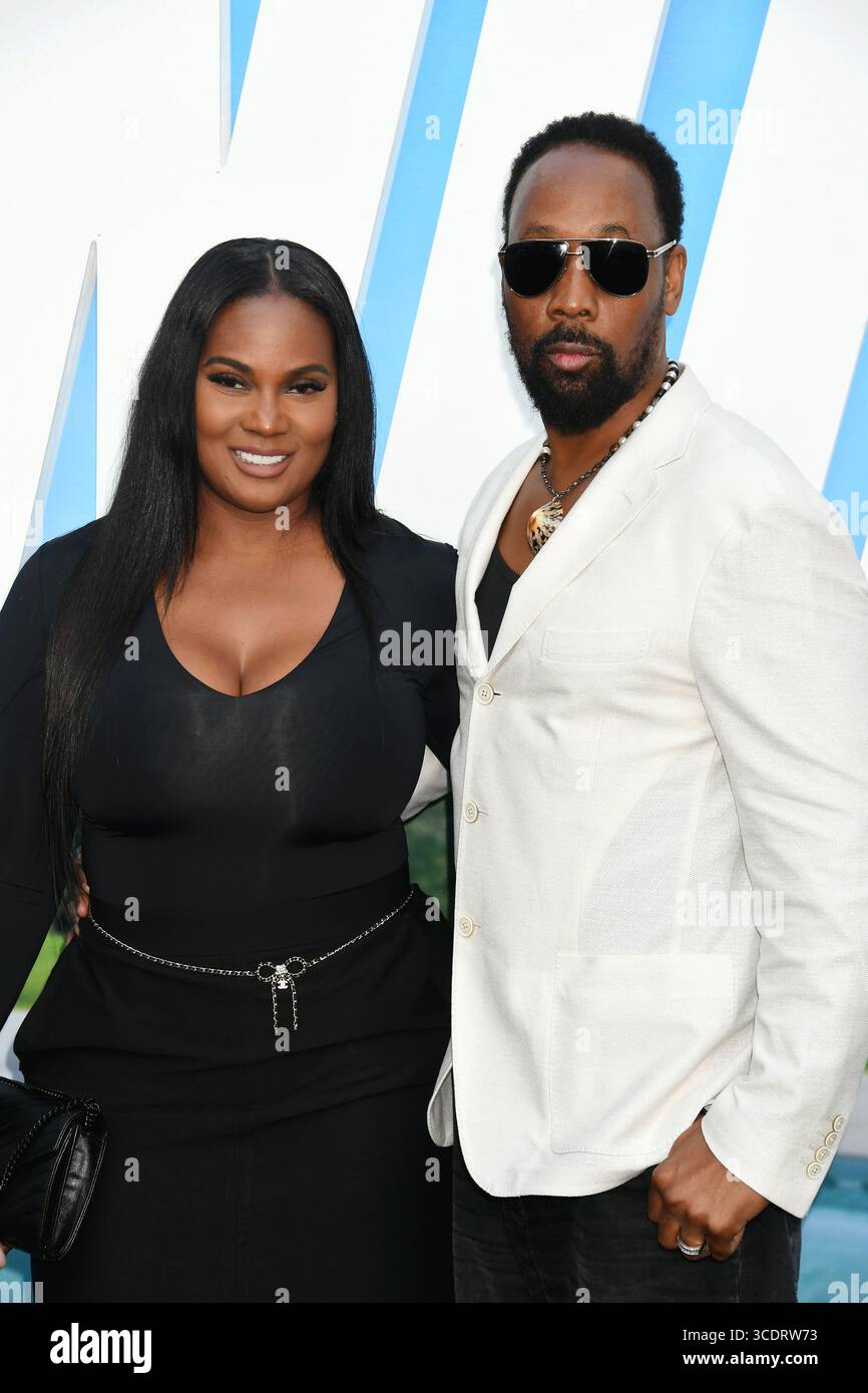 HOLLYWOOD, CALIFORNIA - AUGUST 11: (L-R) Talani Rabb and RZA attend the ...