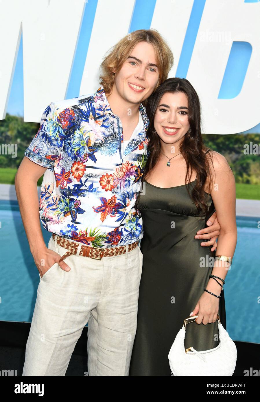 HOLLYWOOD, CALIFORNIA - AUGUST 11: (L-R) Gage Munroe and Marissa Bondi attend the premiere of ...