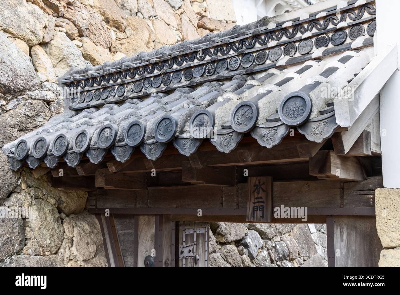 Roof of entrance porch in Himeji Castle with traditional kawara tubular ...
