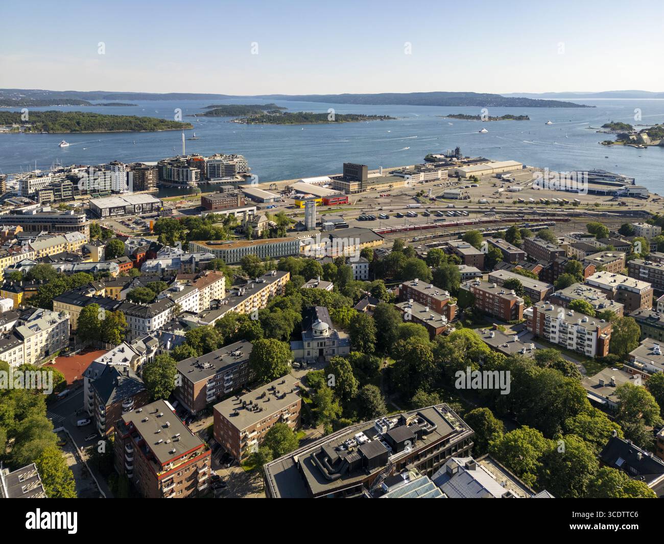 Aerial view of the vibrant cityscape meeting the serene waters of the ...