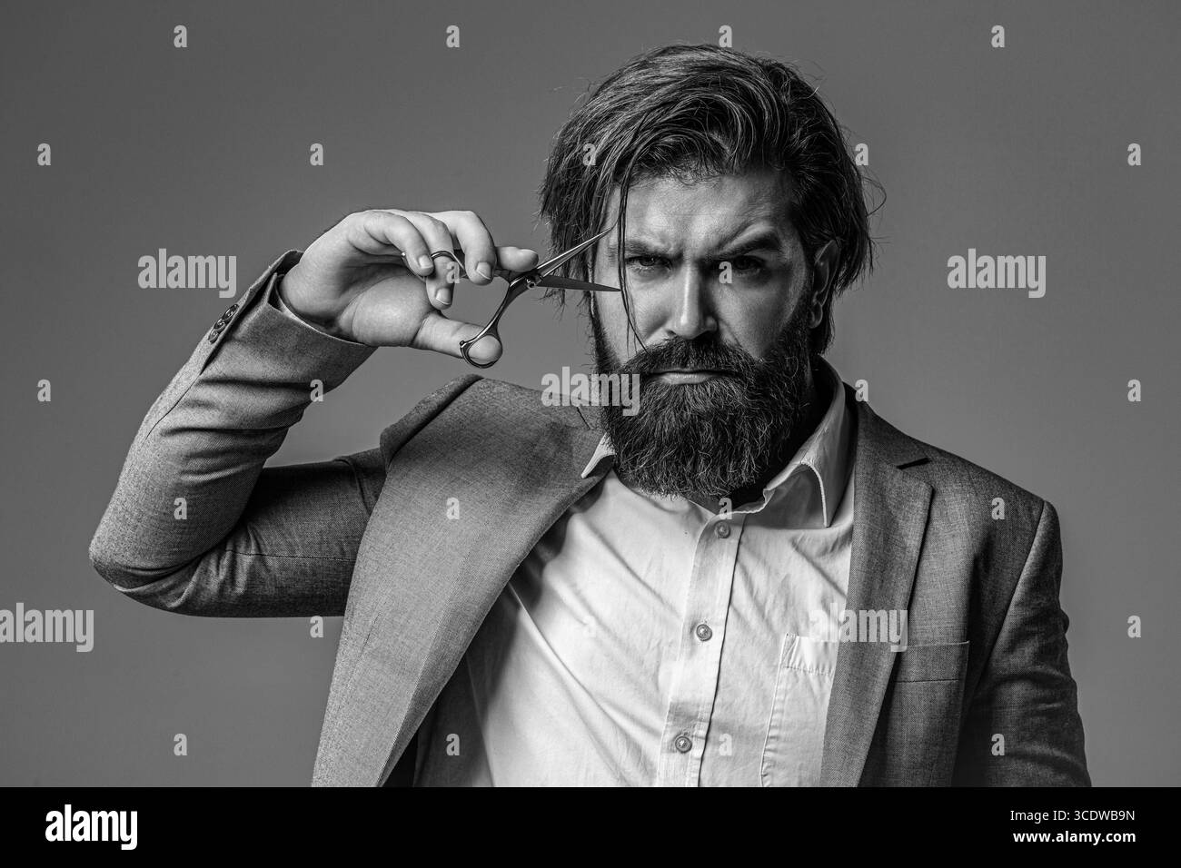 Barber haircut hair using scissors Black and White Stock Photos ...