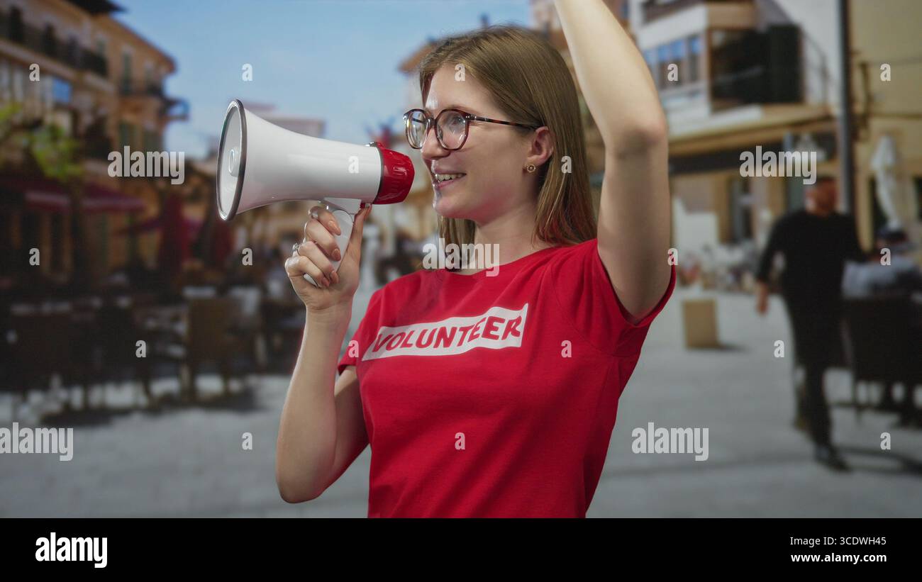 Woman raises arm holds hi-res stock photography and images - Alamy