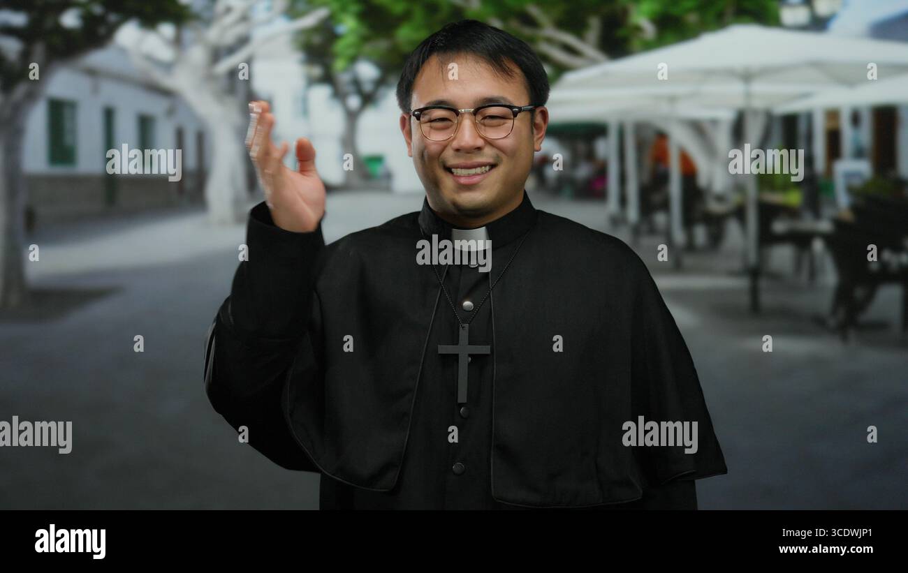 Asian priest wearing glasses stands hi-res stock photography and images ...