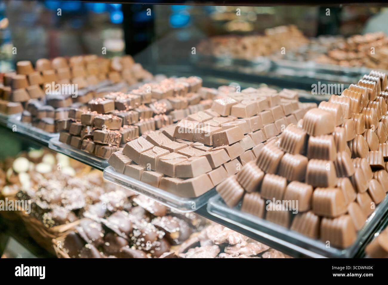 Display case of assorted chocolates. There are many different types of ...