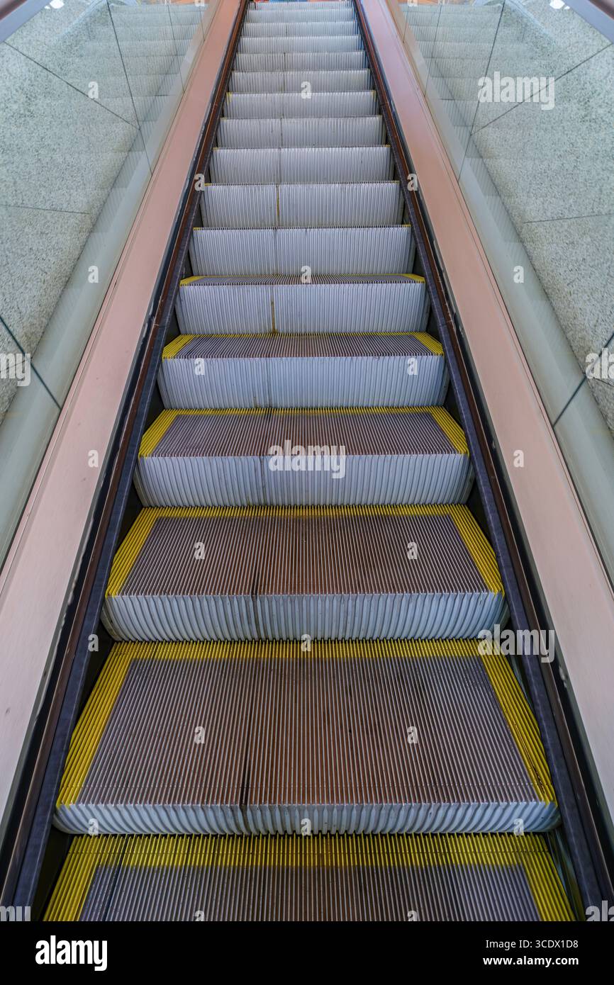 Modern Escalator Moving Upwards with Yellow Safety Lines. Urban ...