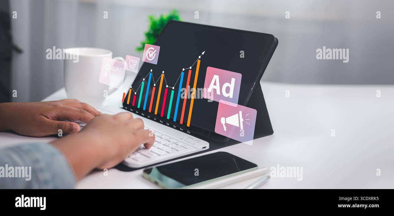 Professional reviewing digital marketing analytics on a tablet with ...