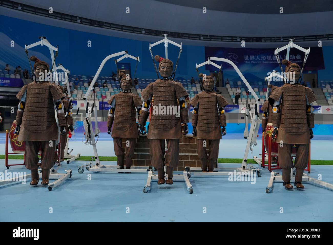 Robots dressed like terracotta warriors are setup before the opening ...