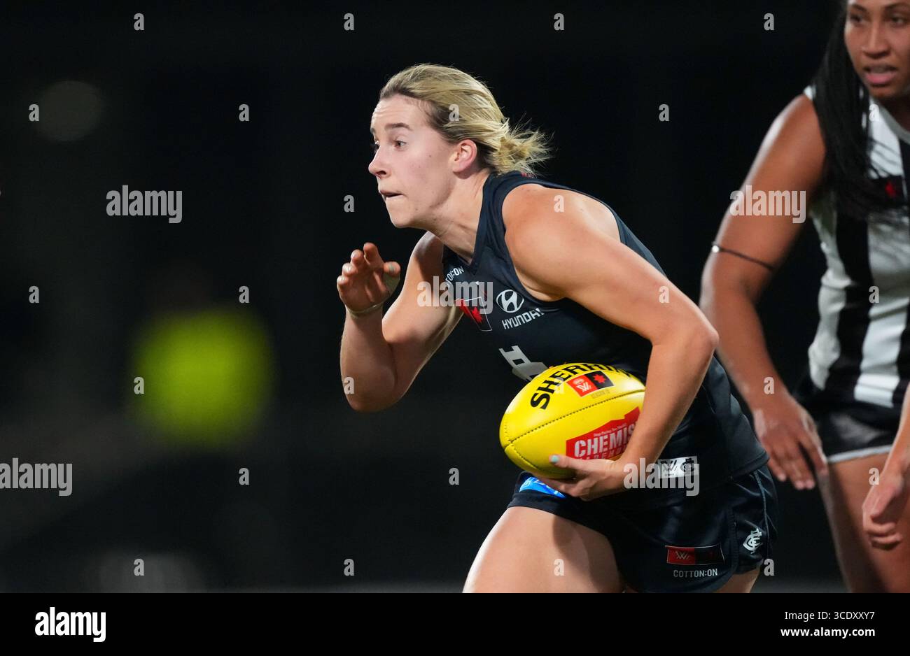 Mimi Hill of Carlton runs with the ball during the AFLW Round 1 match ...