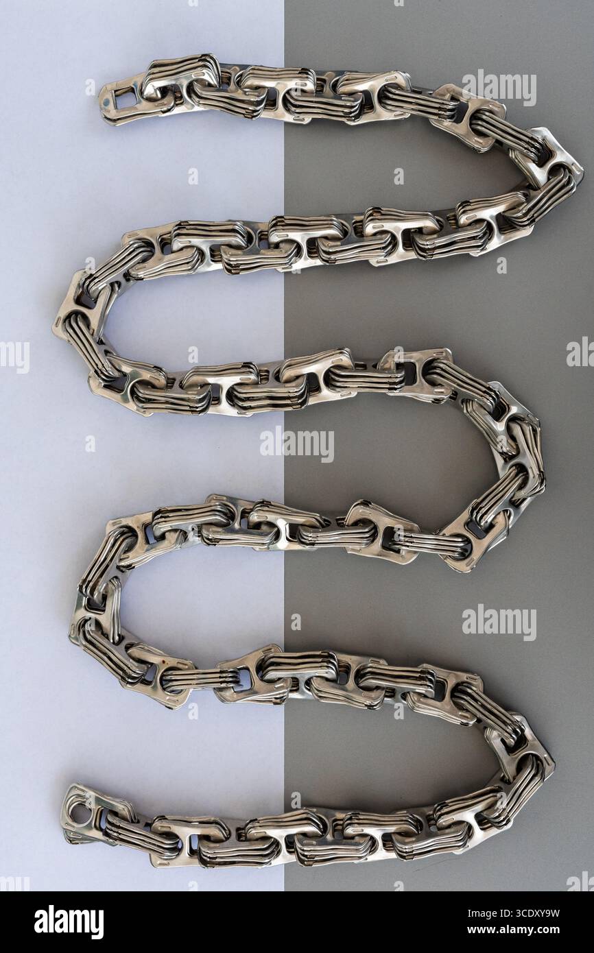 Creative chain made from aluminum can tabs, a conceptual artwork ...