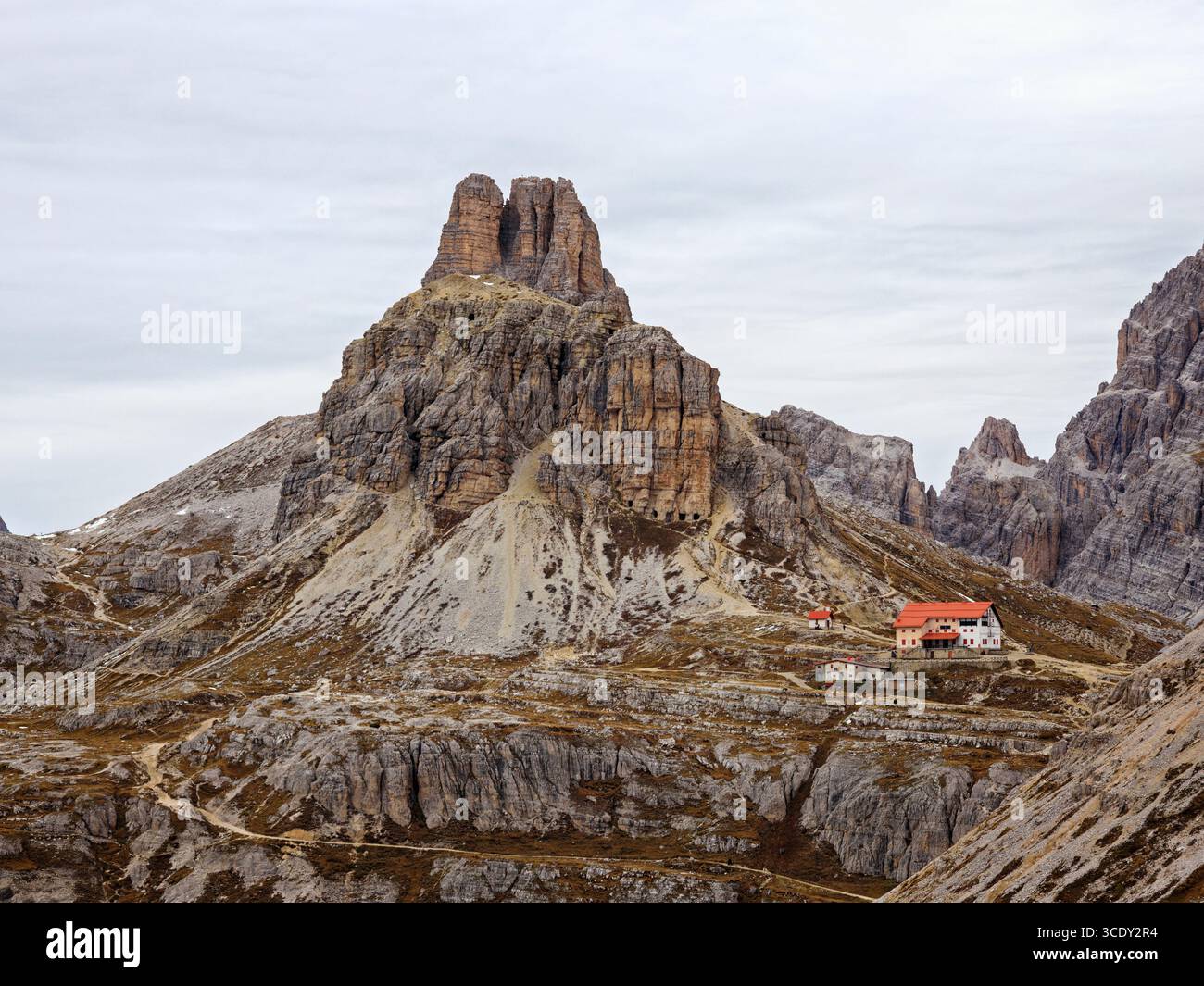 The famous Rifugio Locatelli mountain hut at the foot of a towering ...