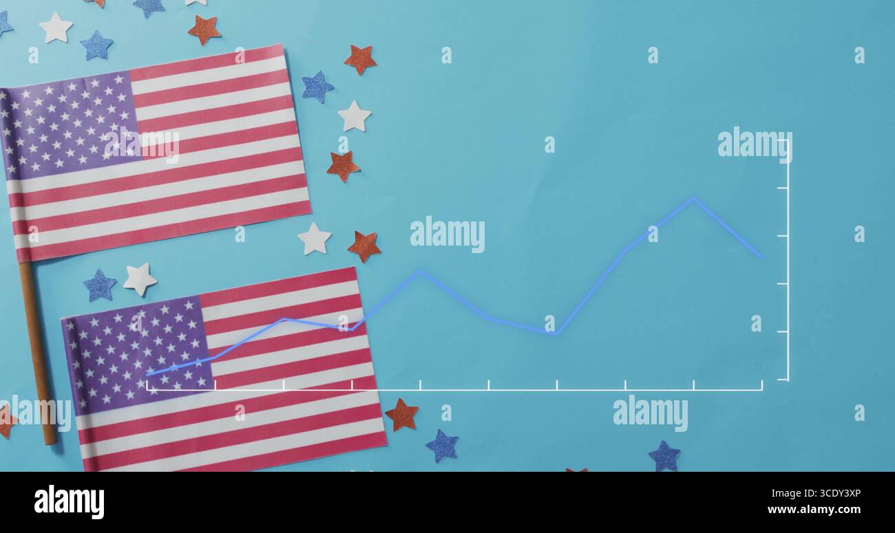 Displaying two American flags on sticks lying on tabletop, with ...