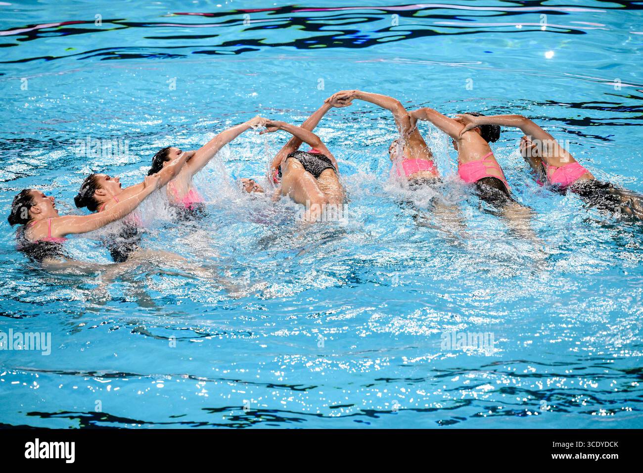 Athletes of team Australia compete in the artistic swimming team ...