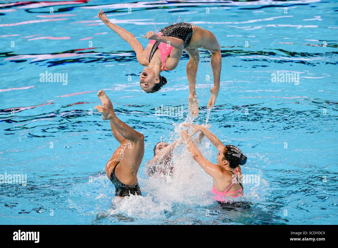 Athletes of team Australia compete in the artistic swimming team ...