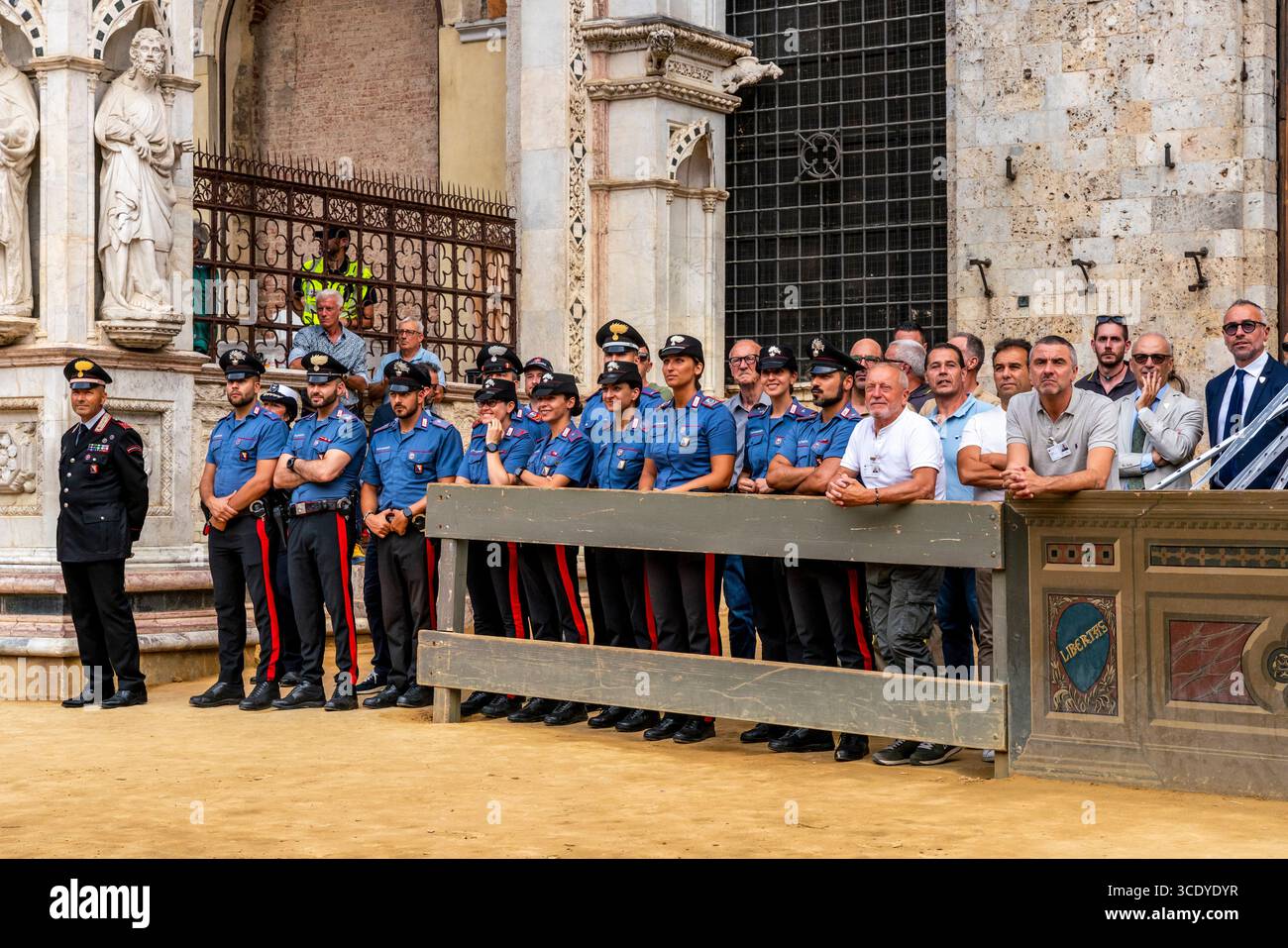 A Group Of Police Officers Watch The Corteo Storico (Historical ...