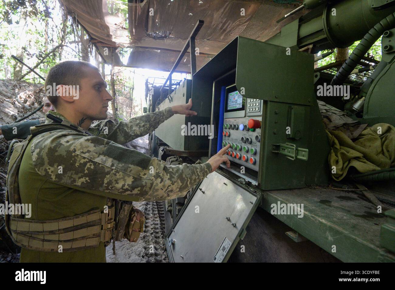 A soldier goes through training on a 2S22 Bohdana self-propelled ...